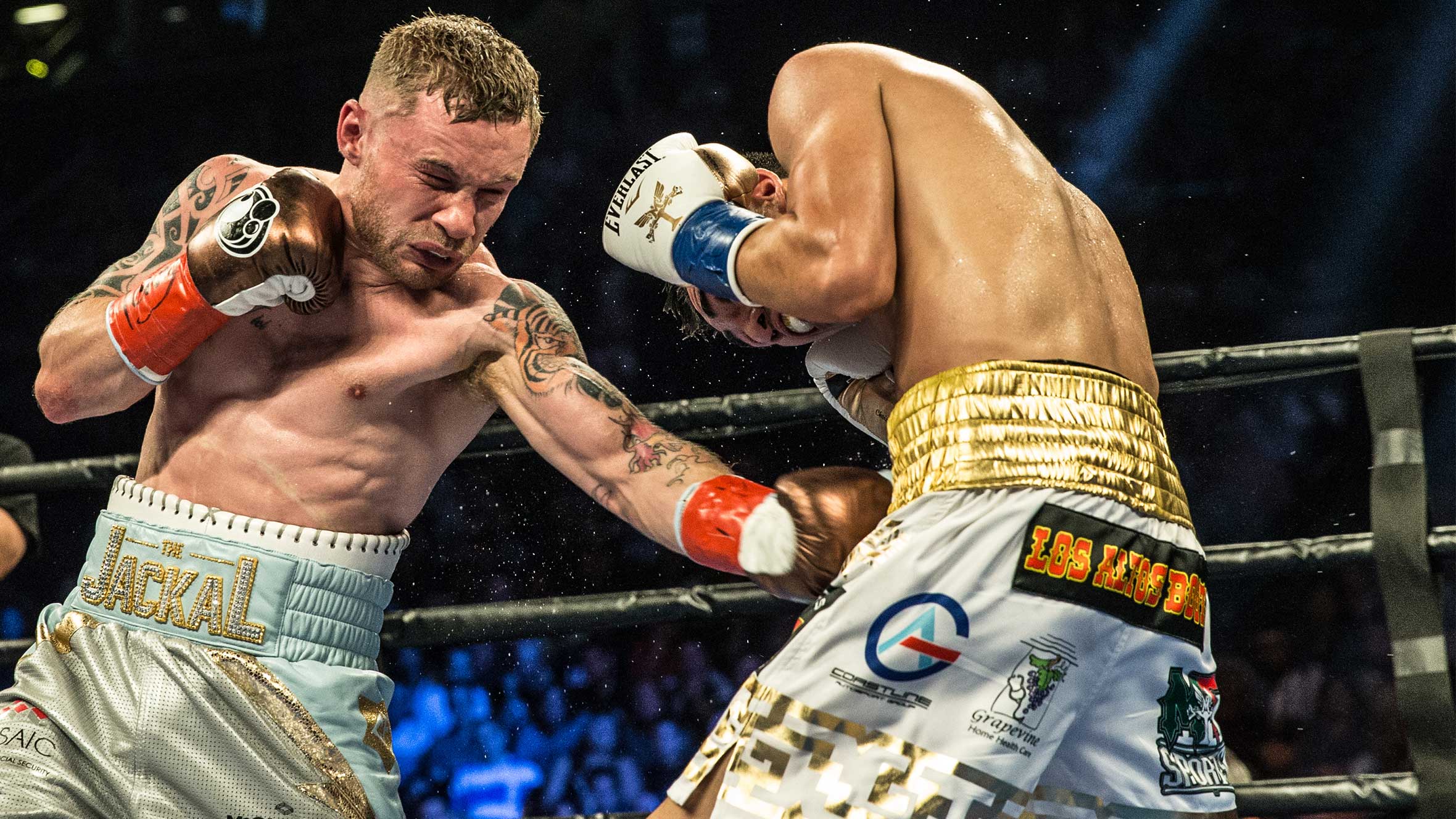 Frampton outlasts Santa Cruz to win 126-pound world title