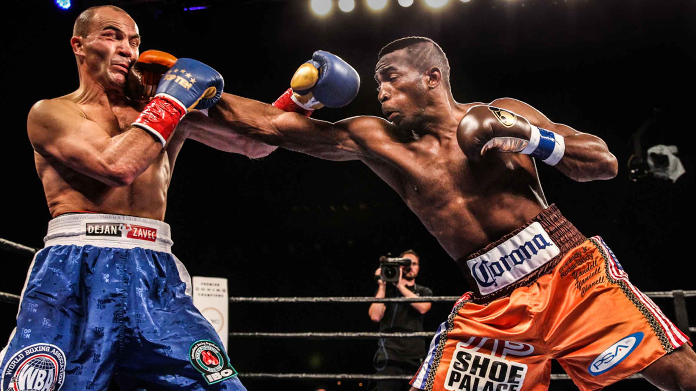 Erislandy Lara storms past Jan Zaveck on a soggy night to retain his ...