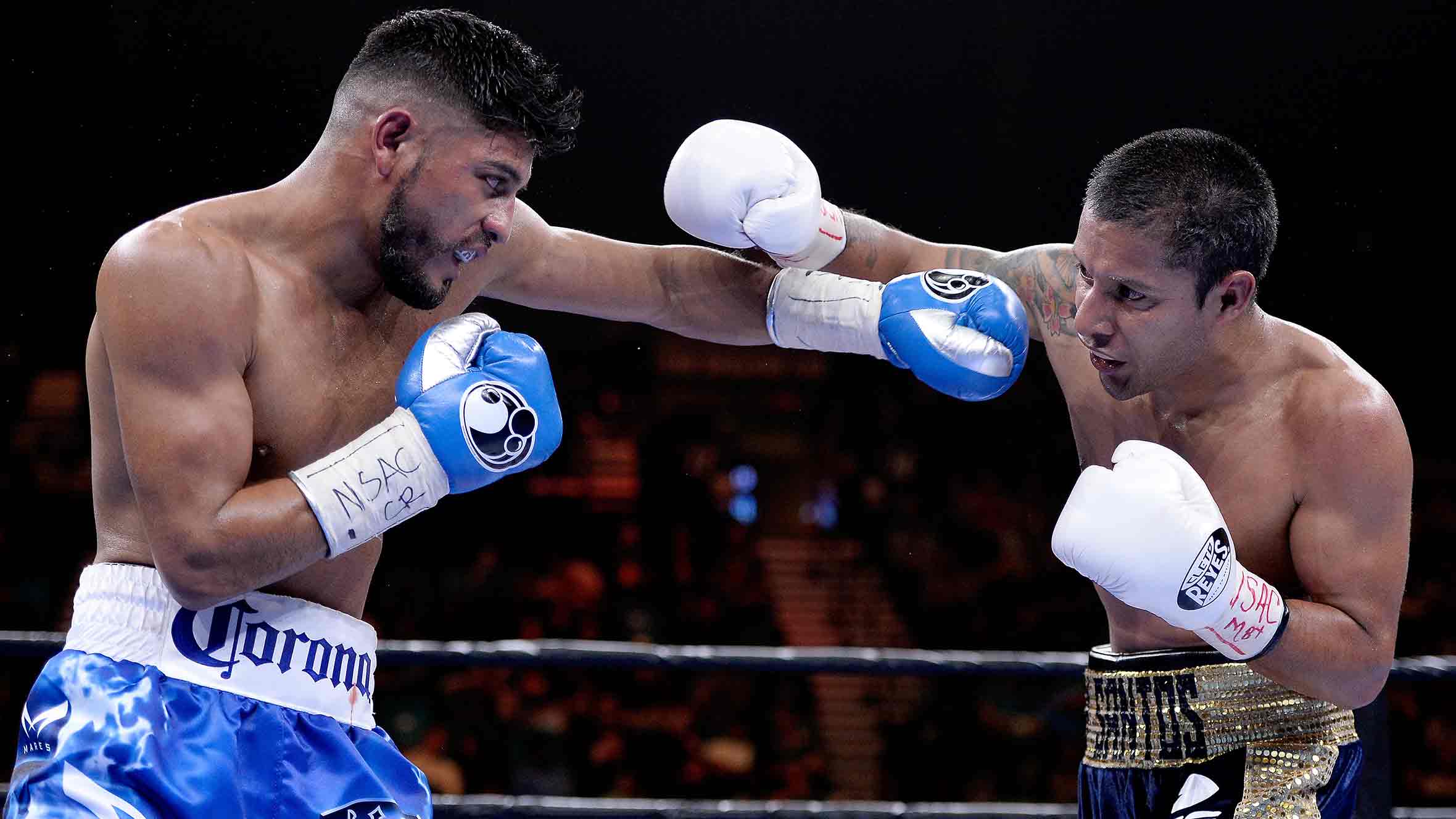 Abner Mares triumphs in bruising slugfest