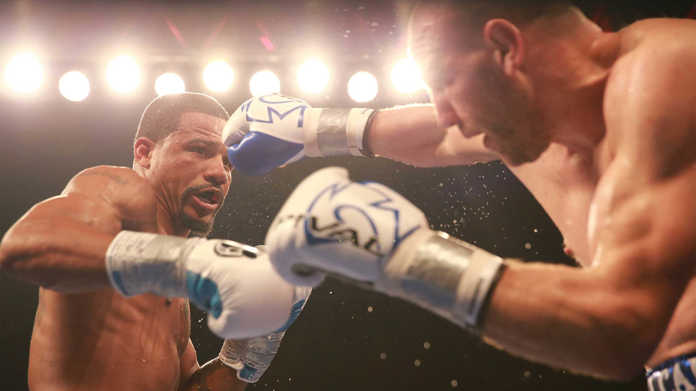 Andre Dirrell rises from early knockdown, dominates Blake Caparello